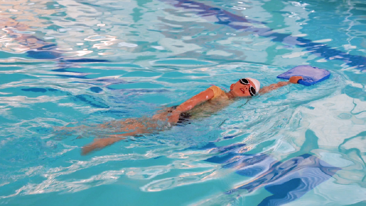 Swimming lessons helped improve Rose's development says mum Laura