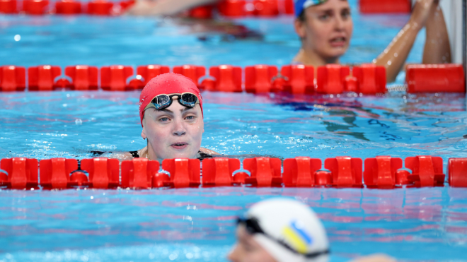 Two personal best times and two medals in the pool for Paralympics GB